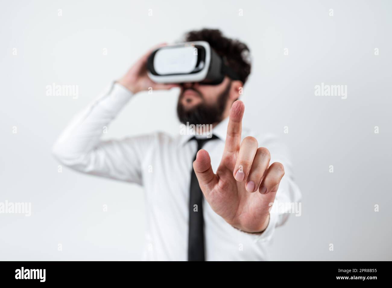 Man Wearing Vr Glasses And Pointing On Important Messages With One ...