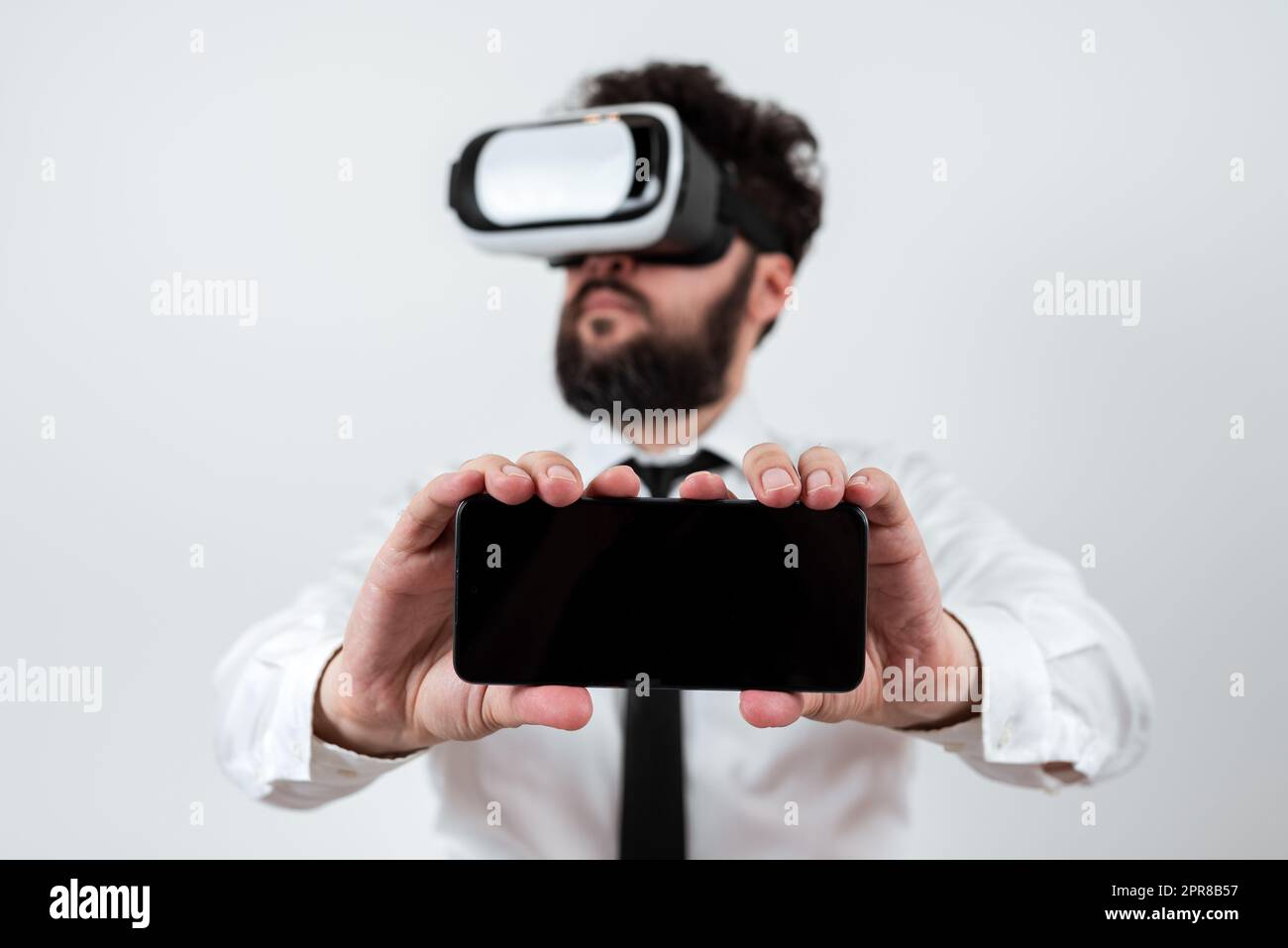Standig Man Holding Mobile Phone With Important Messages And Wearing Vr ...