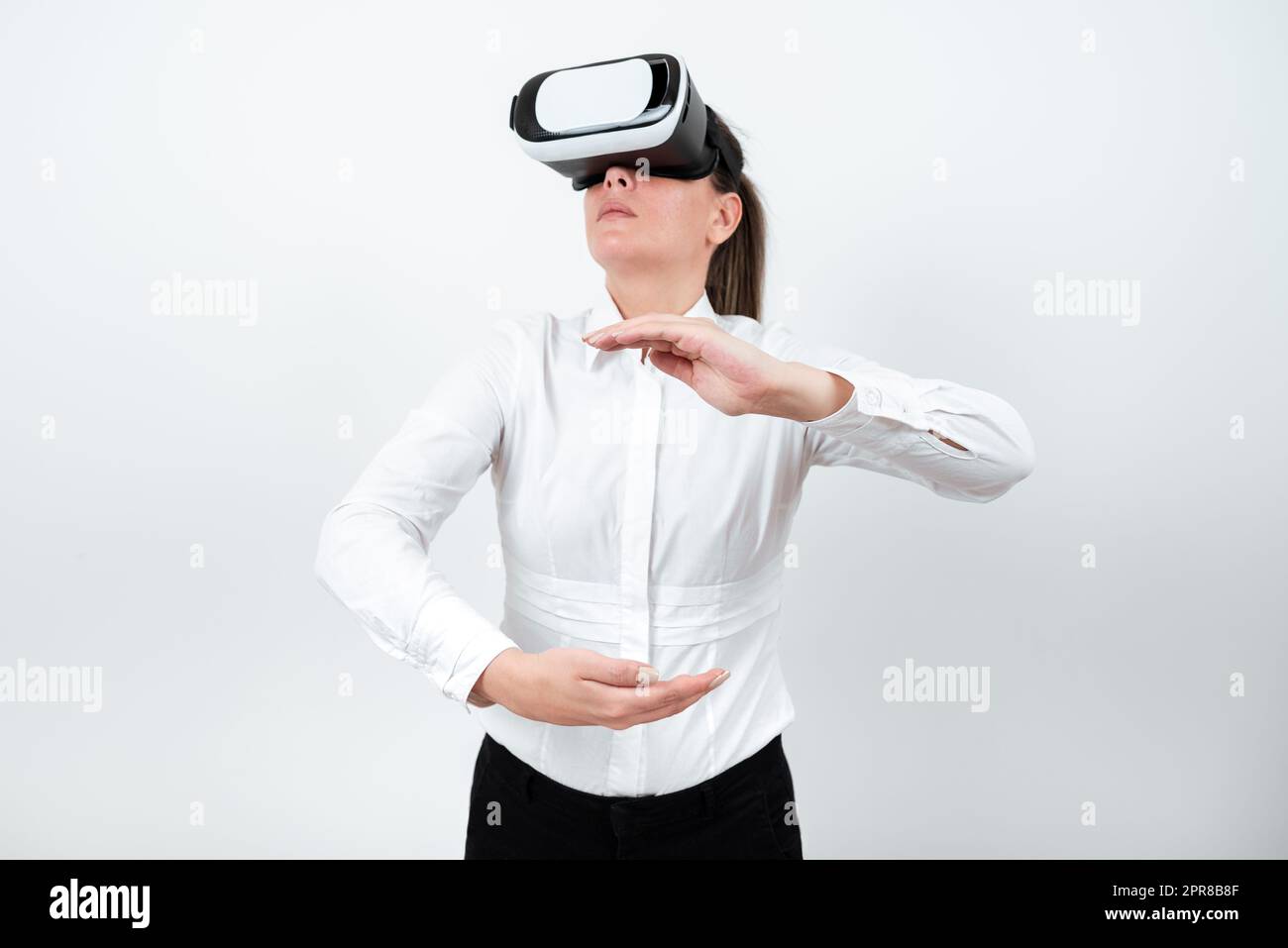 Woman Wearing Vr Glasses And Presenting Important Messages Between Hands. Businesswoman Having ...