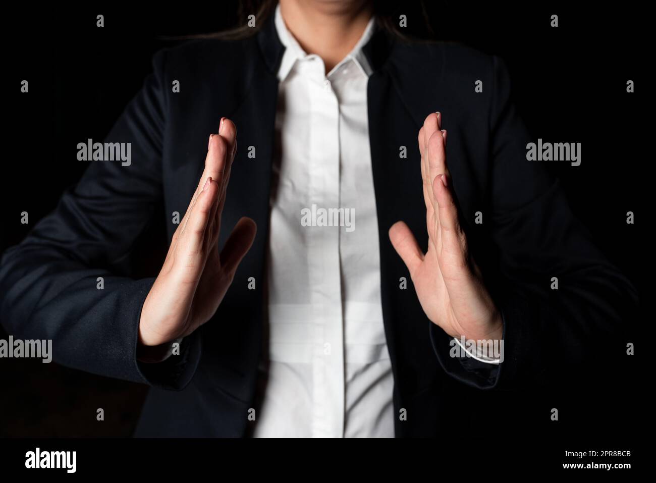 Businesswoman Holding Important Message Between Hands. Woman In Suit ...