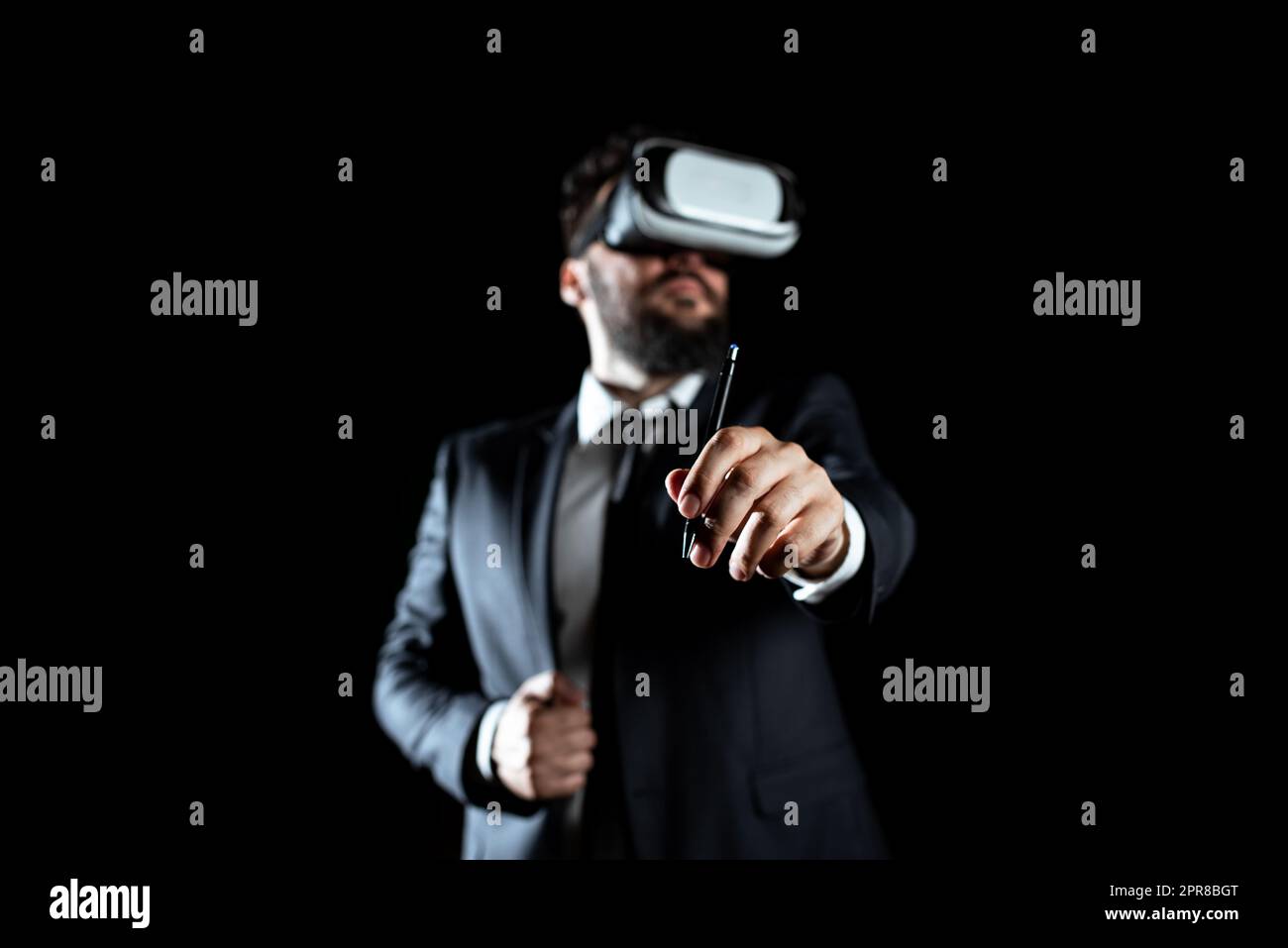 Male Professional Wearing Virtual Reality Goggles Holding Pen And ...