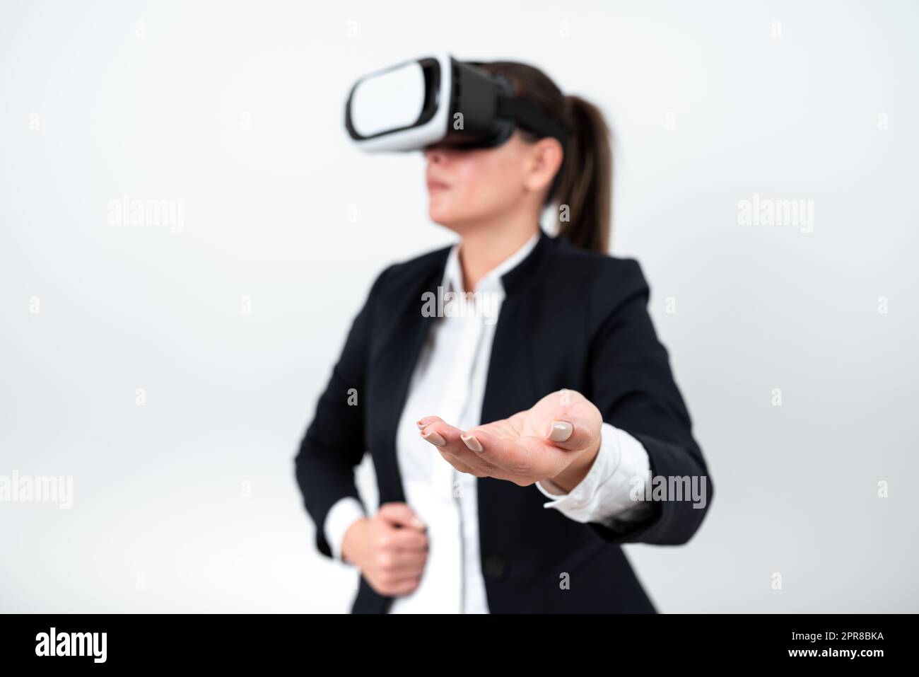 Woman Wearing Vr Glasses And Presenting Important Messages Over One ...