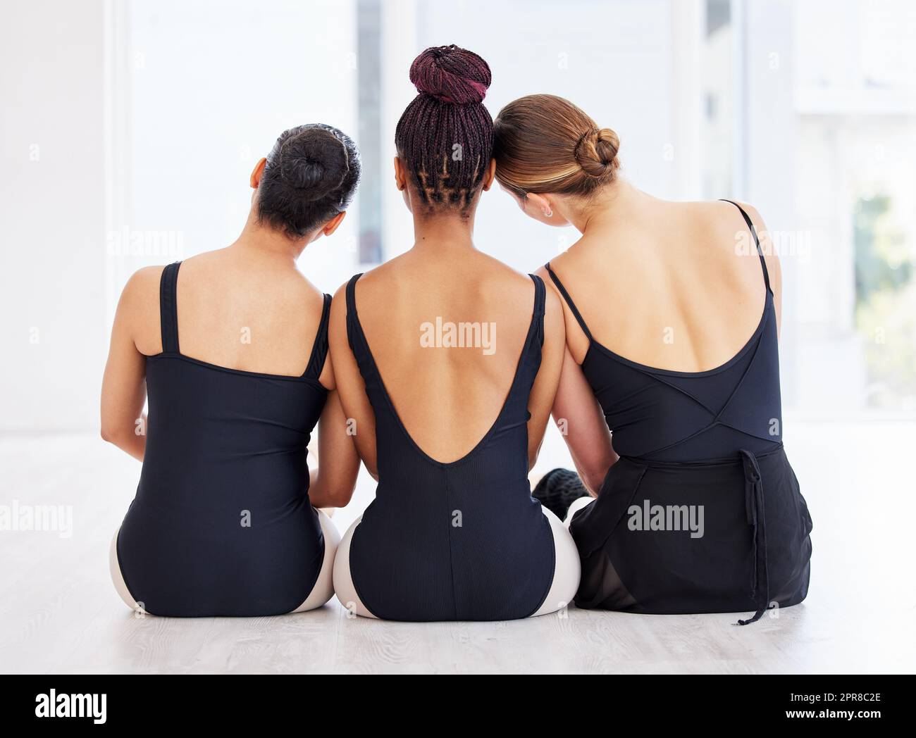 Getting into the right mindset. a group of ballerinas in a row Stock ...