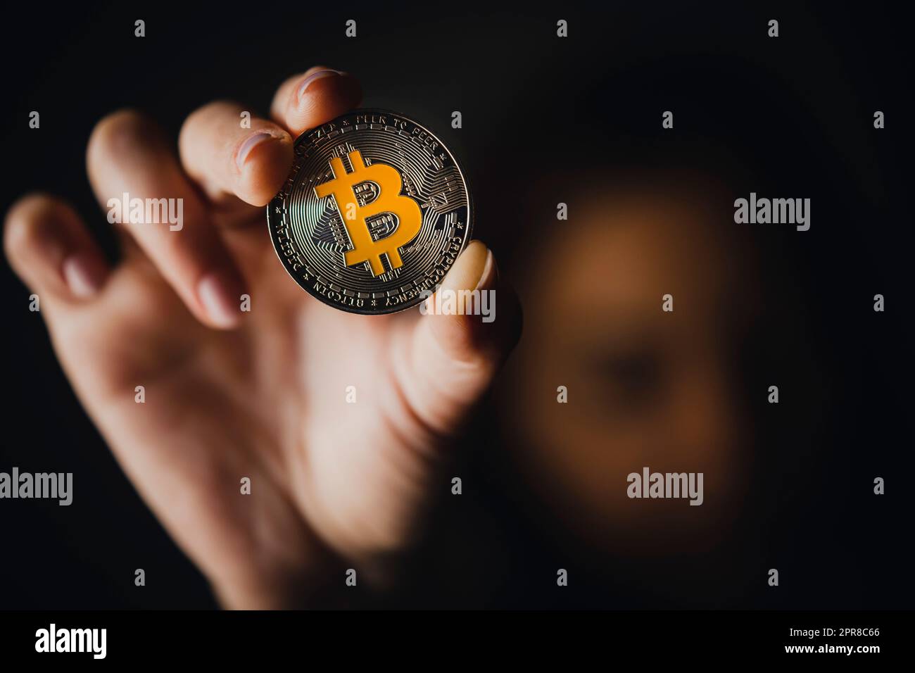 Cryptocurrency hand hi-res stock photography and images - Alamy