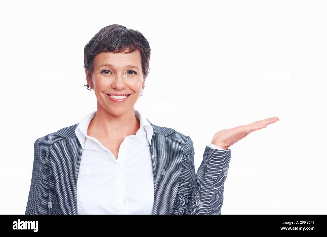 Female executive presenting your product. Portrait of mature female ...