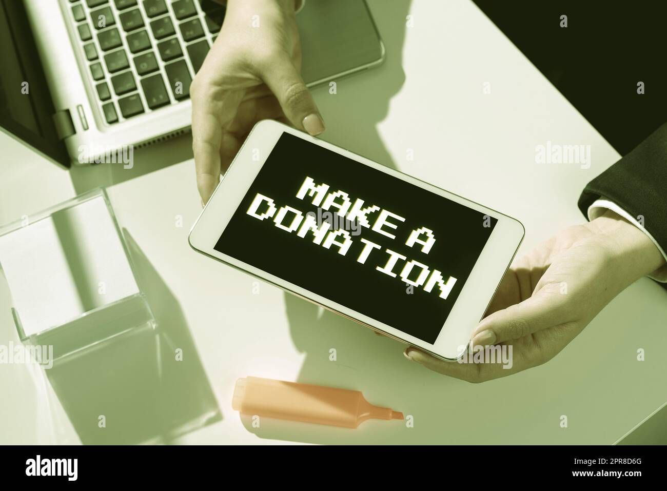 Hand writing sign Make A Donation. Word for Donate giving things not ...