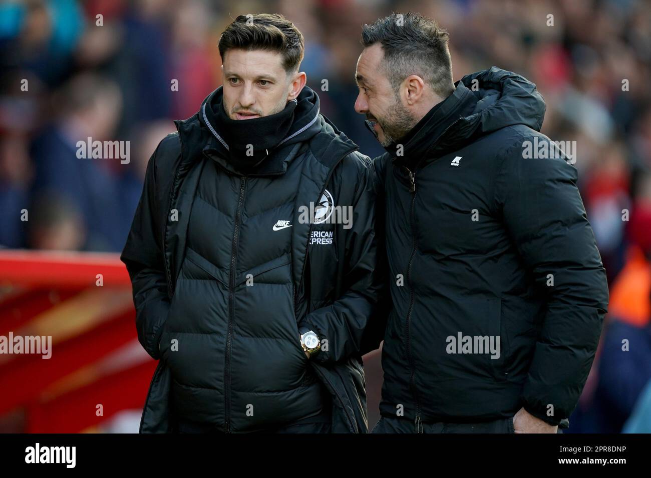 Brighton and Hove Albion Manager, Roberto De Zerbi, (right) interacts ...