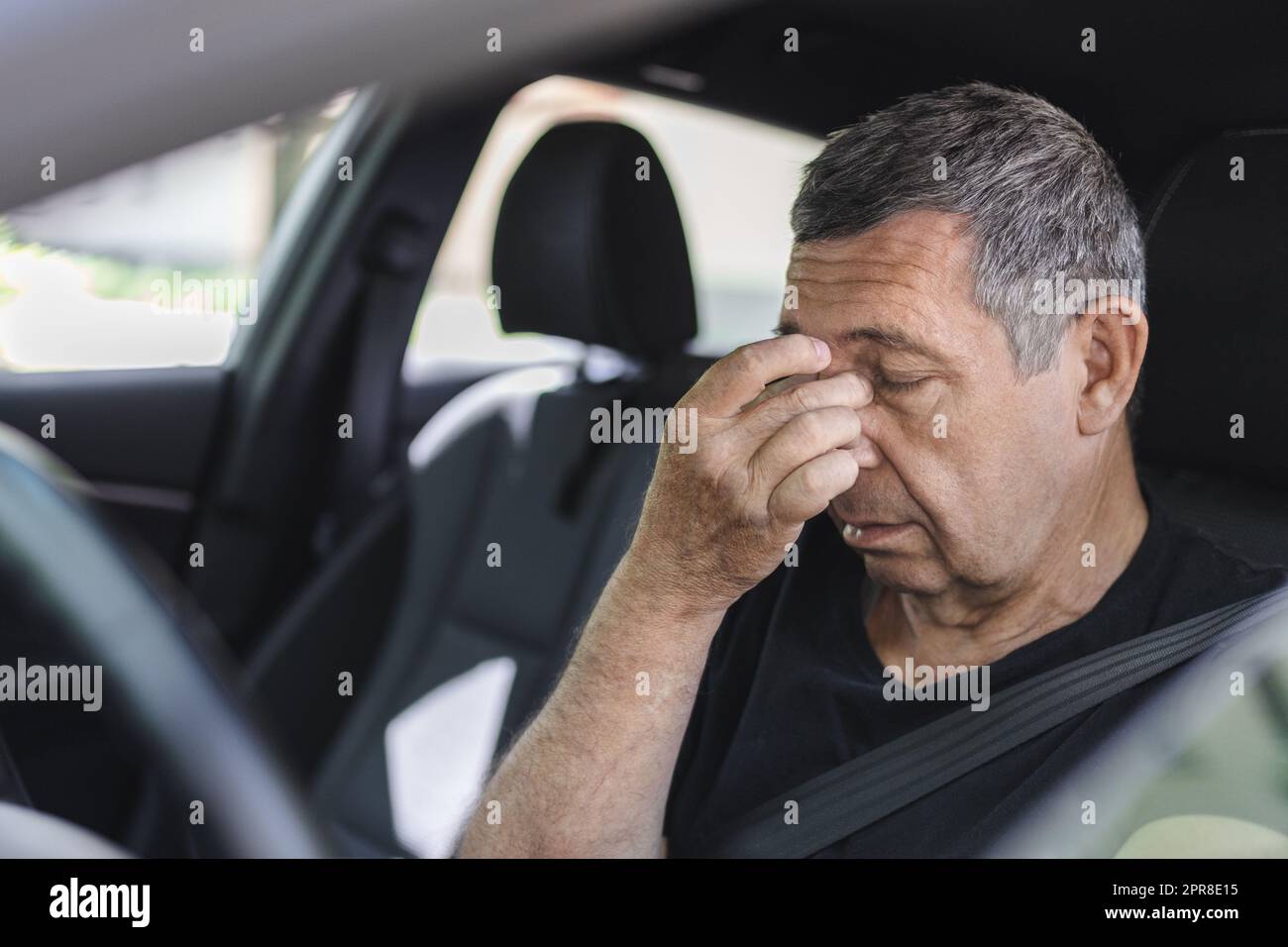 Tired person at wheel of car hi-res stock photography and images - Alamy