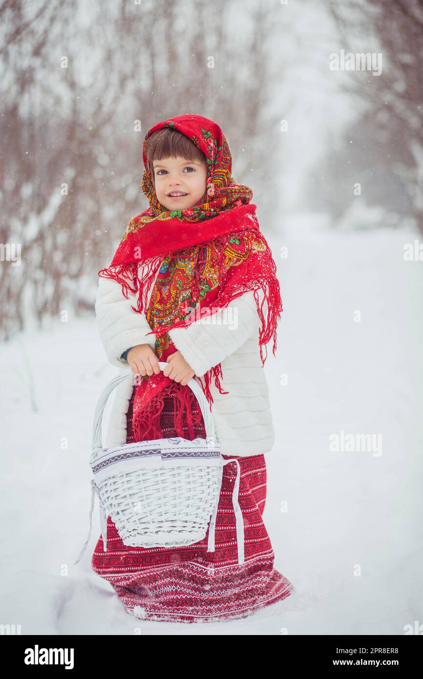Beautiful girl in old Ukrainian clothes in a winter forest Stock Photo ...