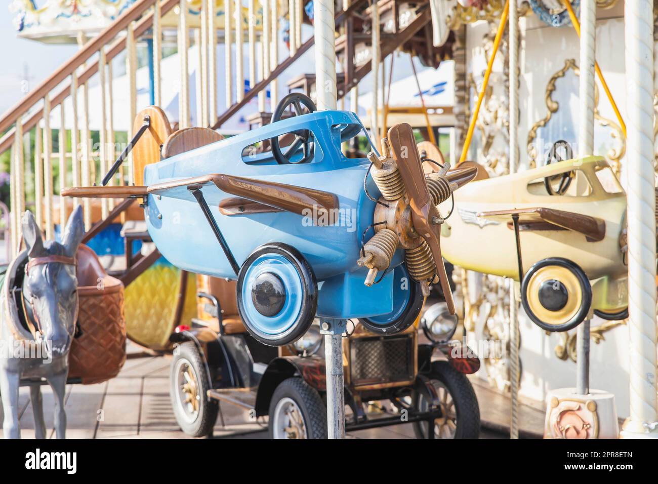 toy plane on a beautiful carousel in an amusement park in Ukraine Stock ...