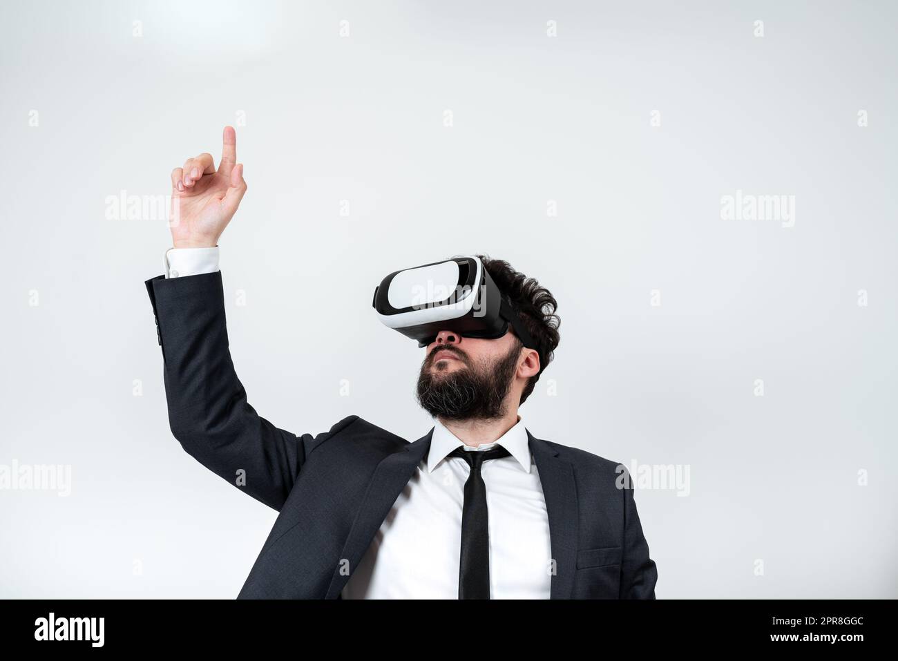Man Wearing Vr Glasses And Pointing On Important Messages With One ...