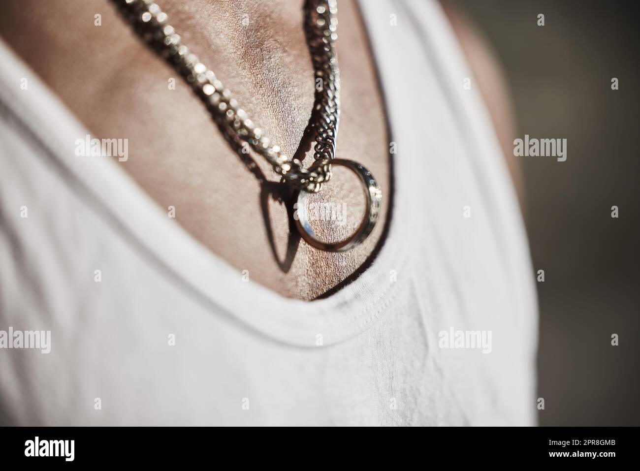 Aint no thing as too much bling. an unrecognisable man wearing a gold ...