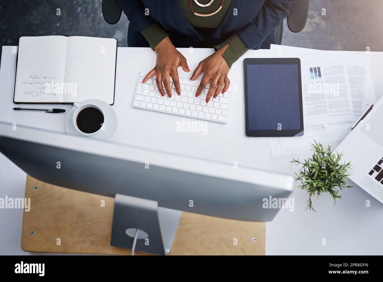Putting productivity first. a businesswoman using a computer at her ...