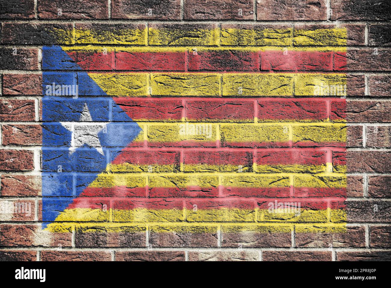 Catalonia independence flag on brick wall red yellow blue white star ...