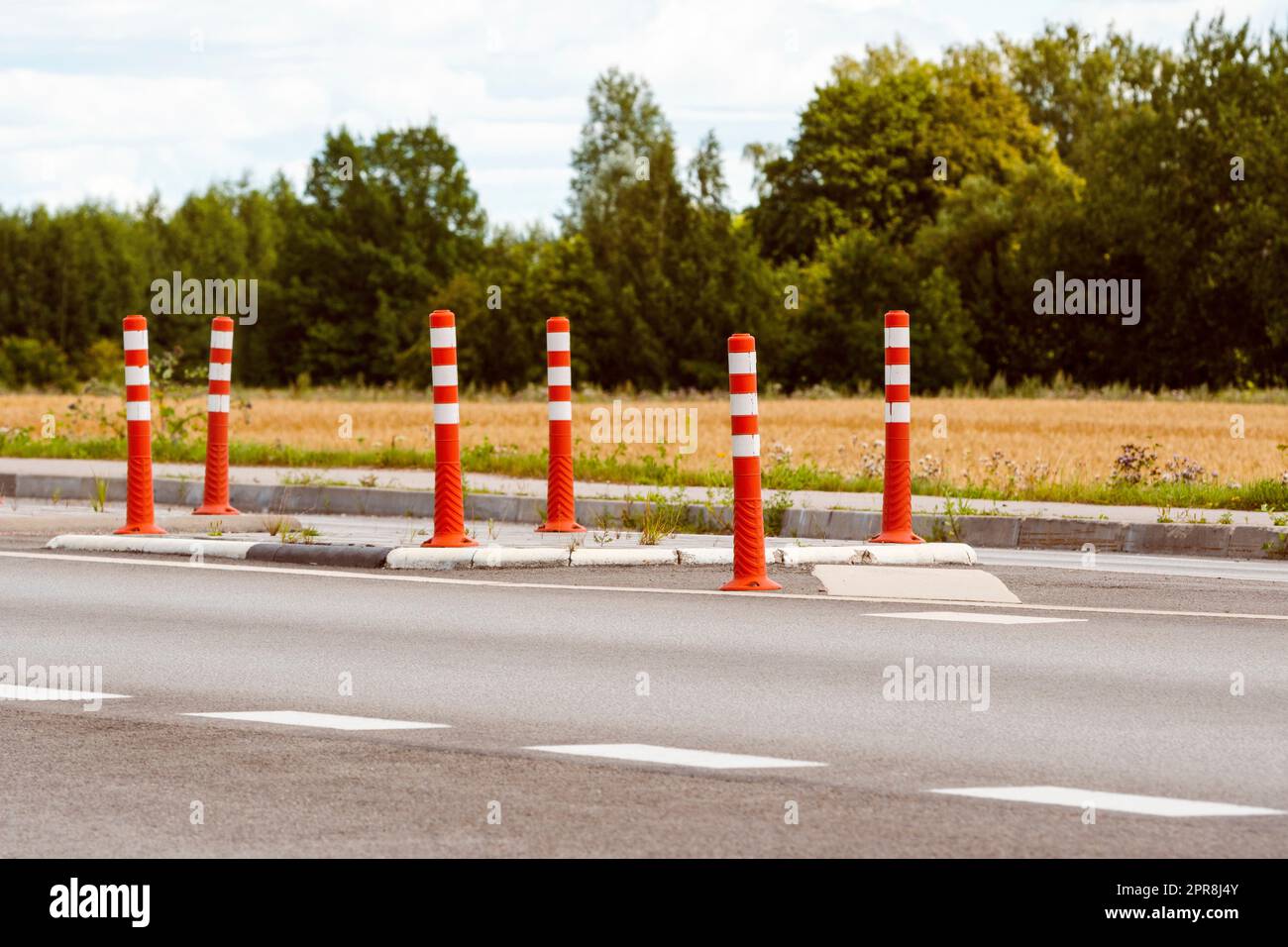 Orange traffic cones on the highway Stock Photo - Alamy