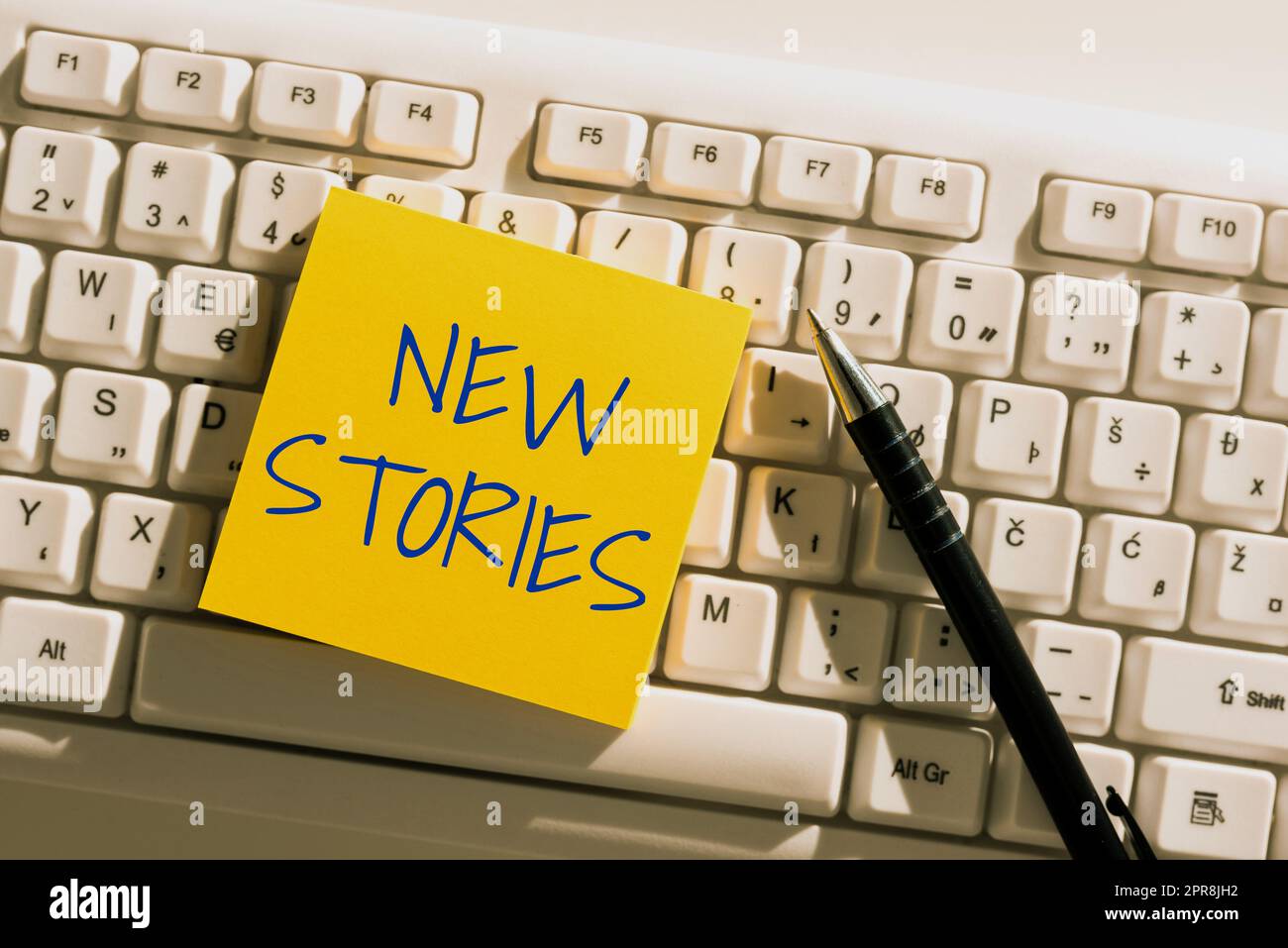 Conceptual caption New Stories. Word Written on imaginary or real ...