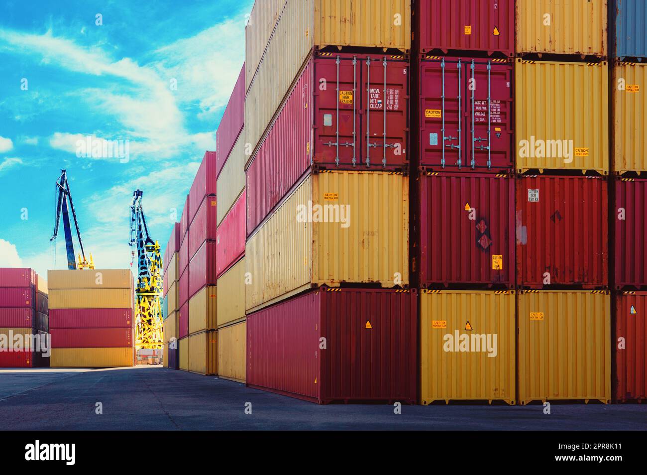 Colored containers stacked in a commercial port Stock Photo - Alamy