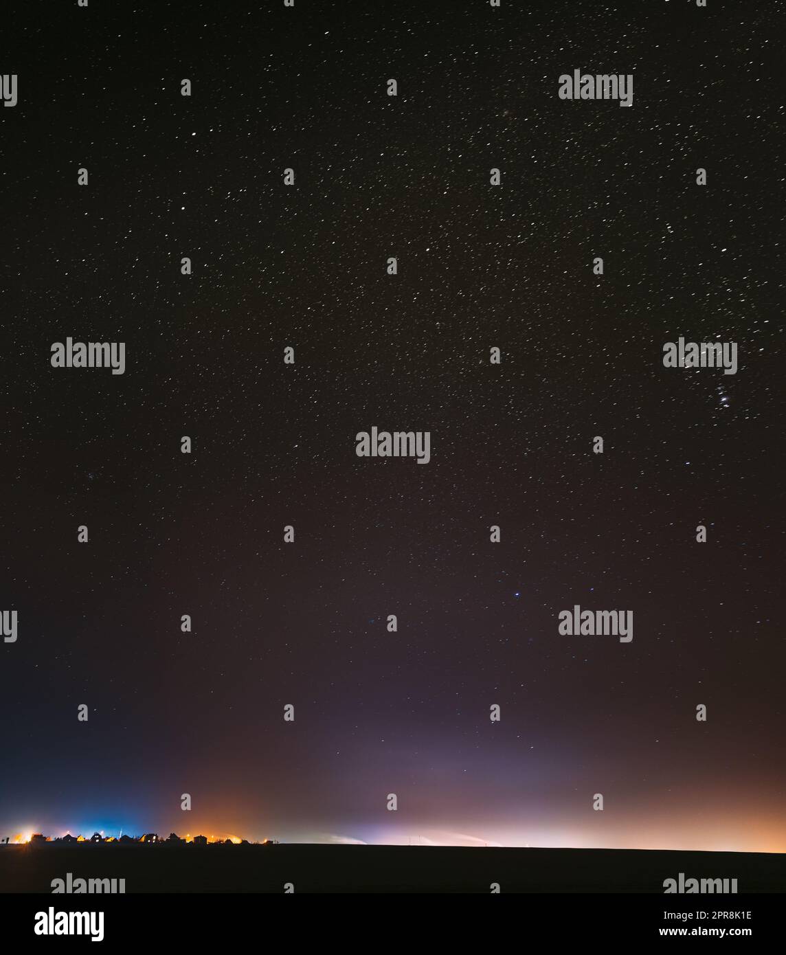 Night Starry Sky With Glowing Stars Above Countryside Town Landscape ...