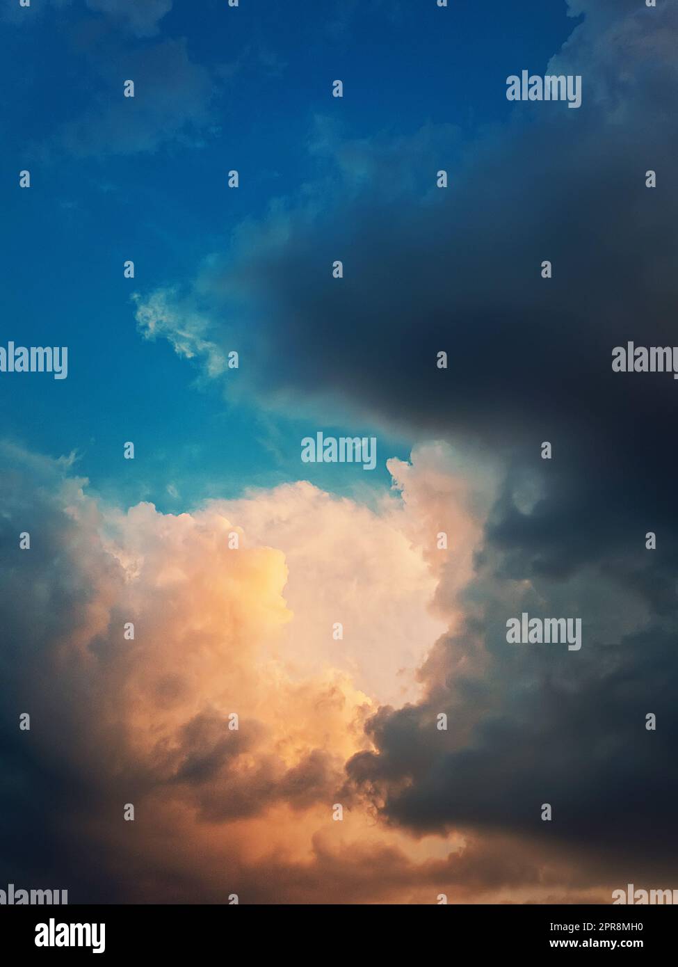 Wonderful storm clouds sunlit with a golden light like coming out of ...