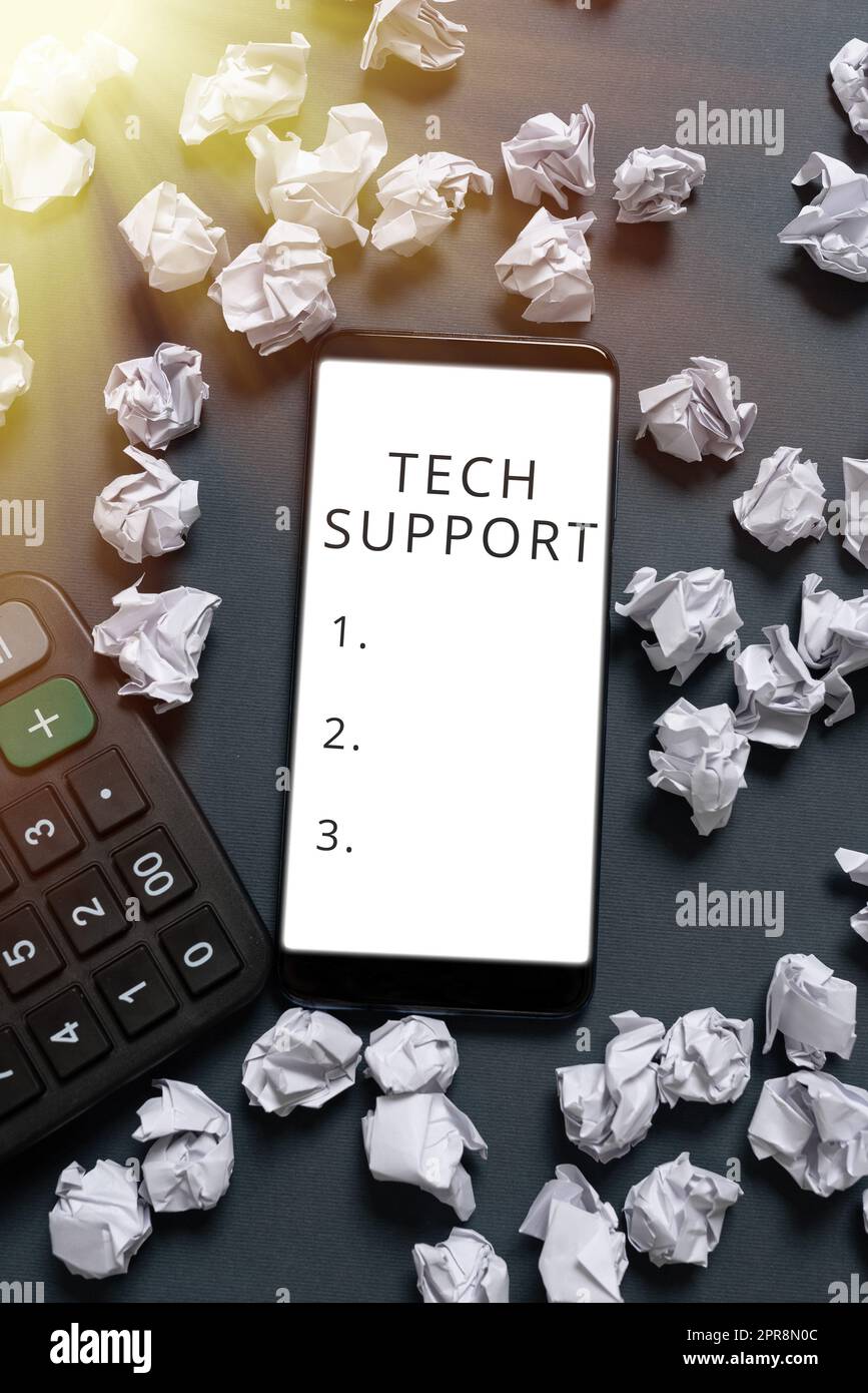 Hand writing sign Tech Support. Concept meaning Assisting individuals ...