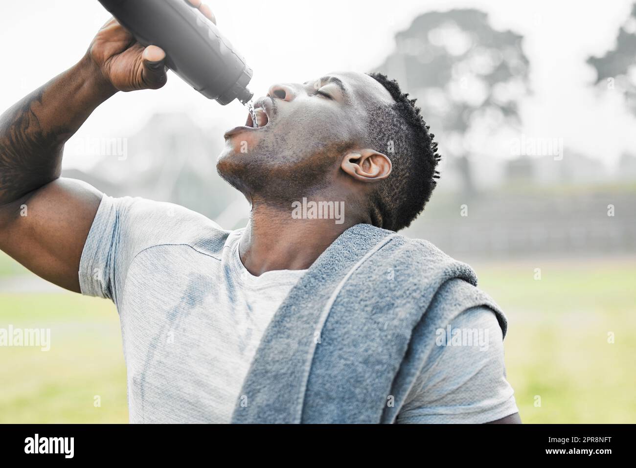 Man Bottled Water While Exercising