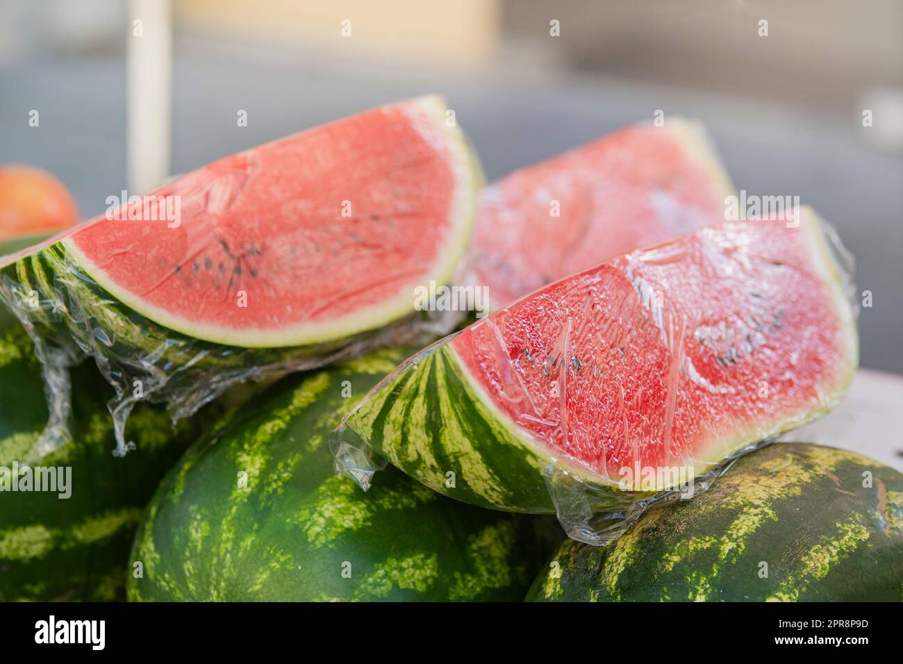 Watermelon in plastic wrap hi-res stock photography and images - Alamy