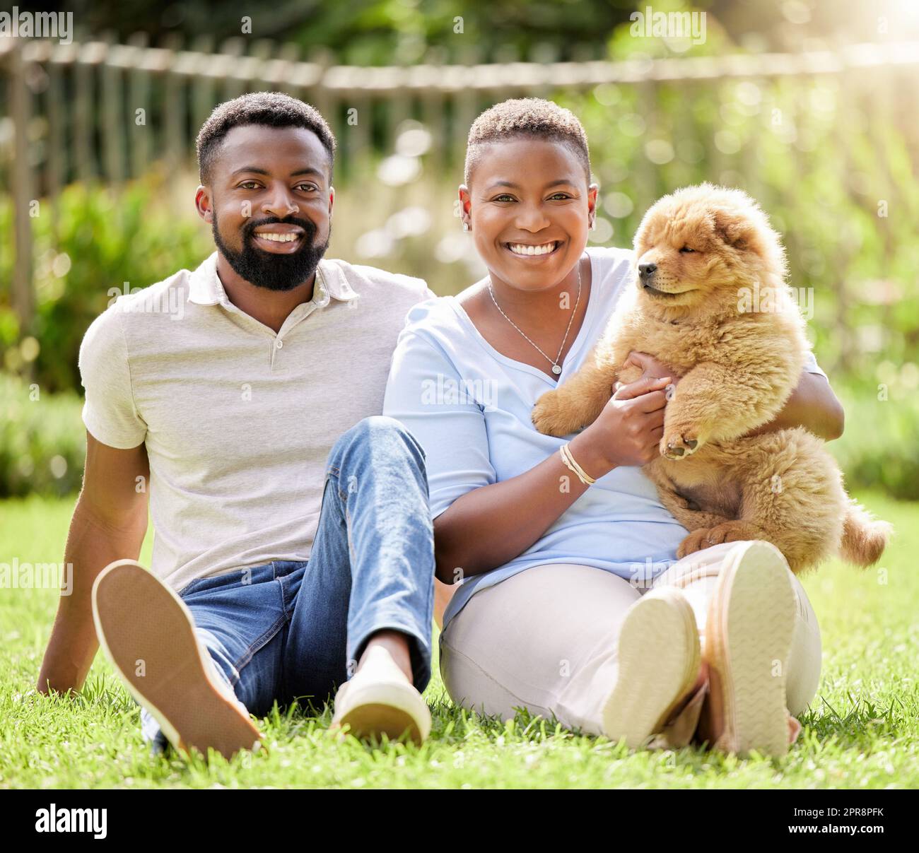 We all love hanging out at the park. Portrait of a young couple ...