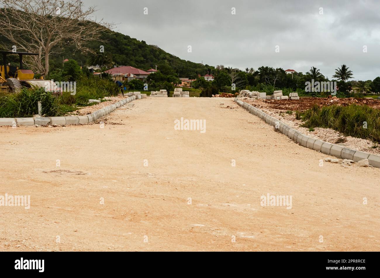 A roadway under construction is covered with compressed marl Stock ...