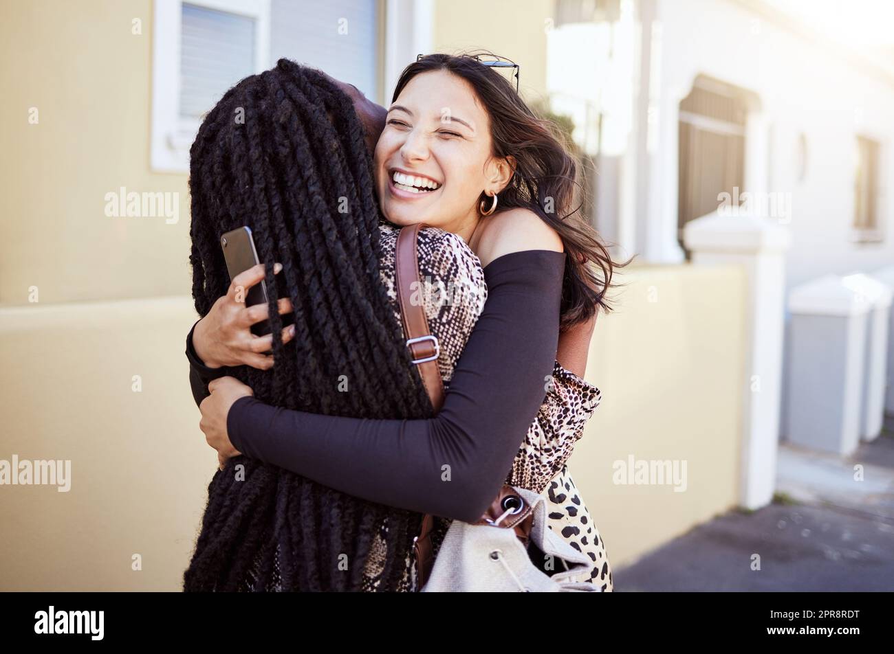 Women hugging friends female hi-res stock photography and images - Alamy