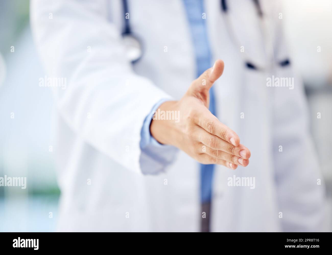 Allow me to introduce myself. Closeup shot of an unrecognisable doctor ...