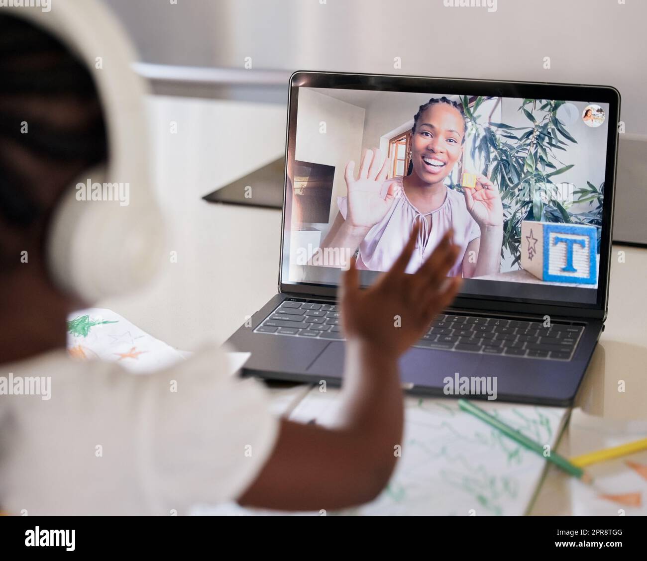 Distance learning with zoom. African american female teacher on a ...