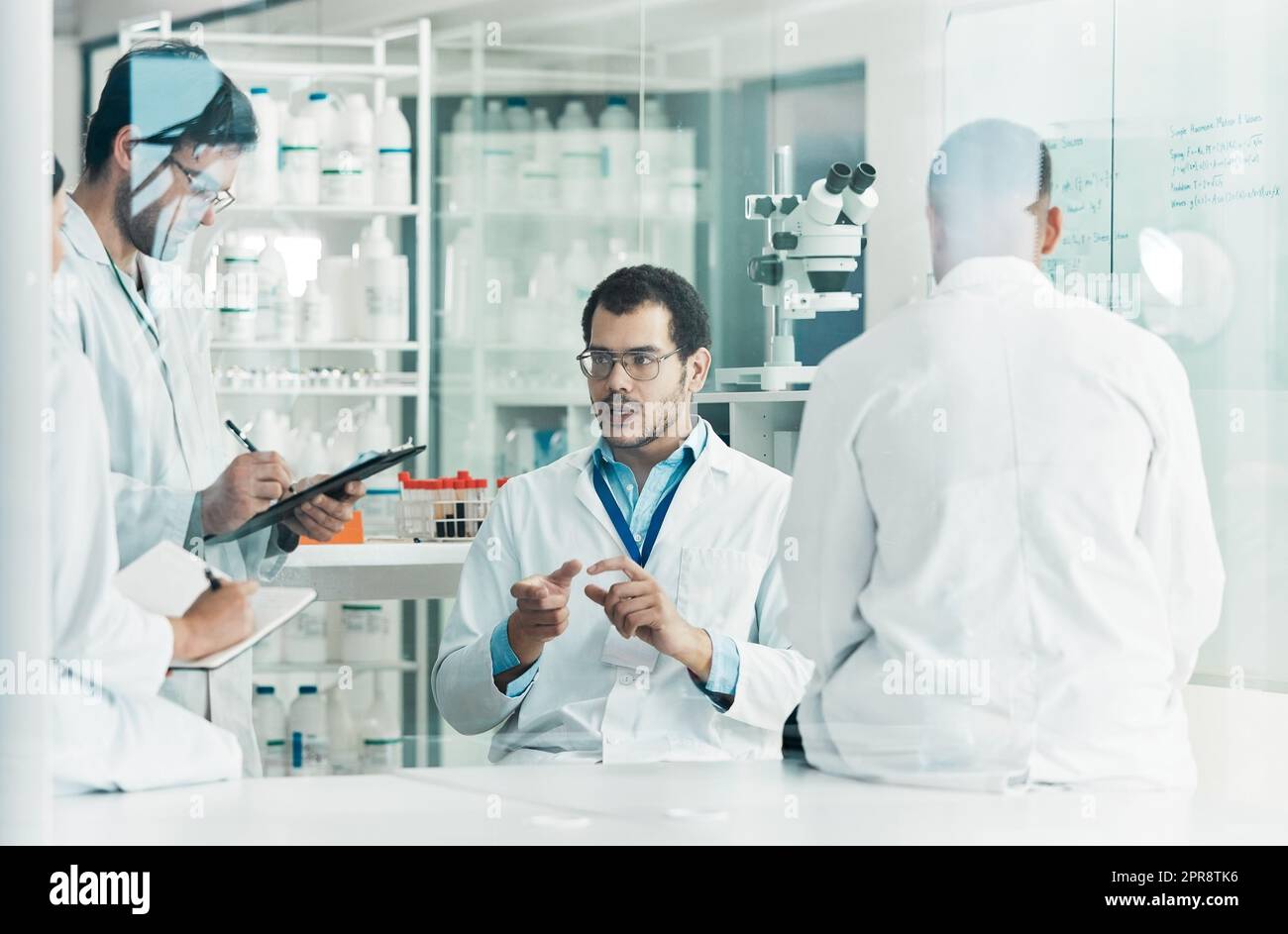 Science promotes great discovery and learning. a group of scientists ...