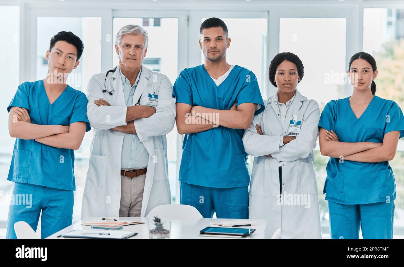Nothing will deter us from our mission of quality healthcare. Portrait of a group of medical ...