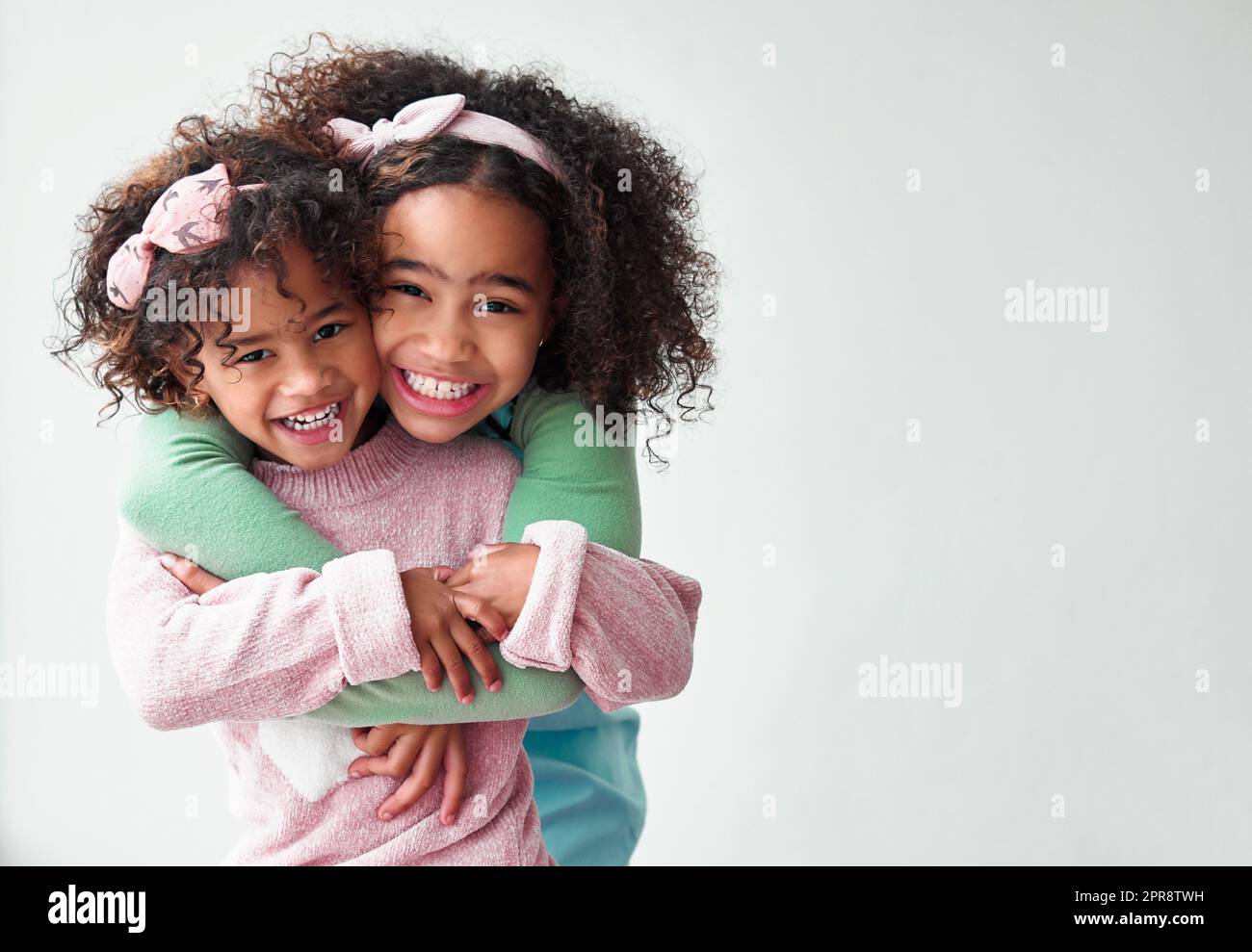 Little Girls Hugging