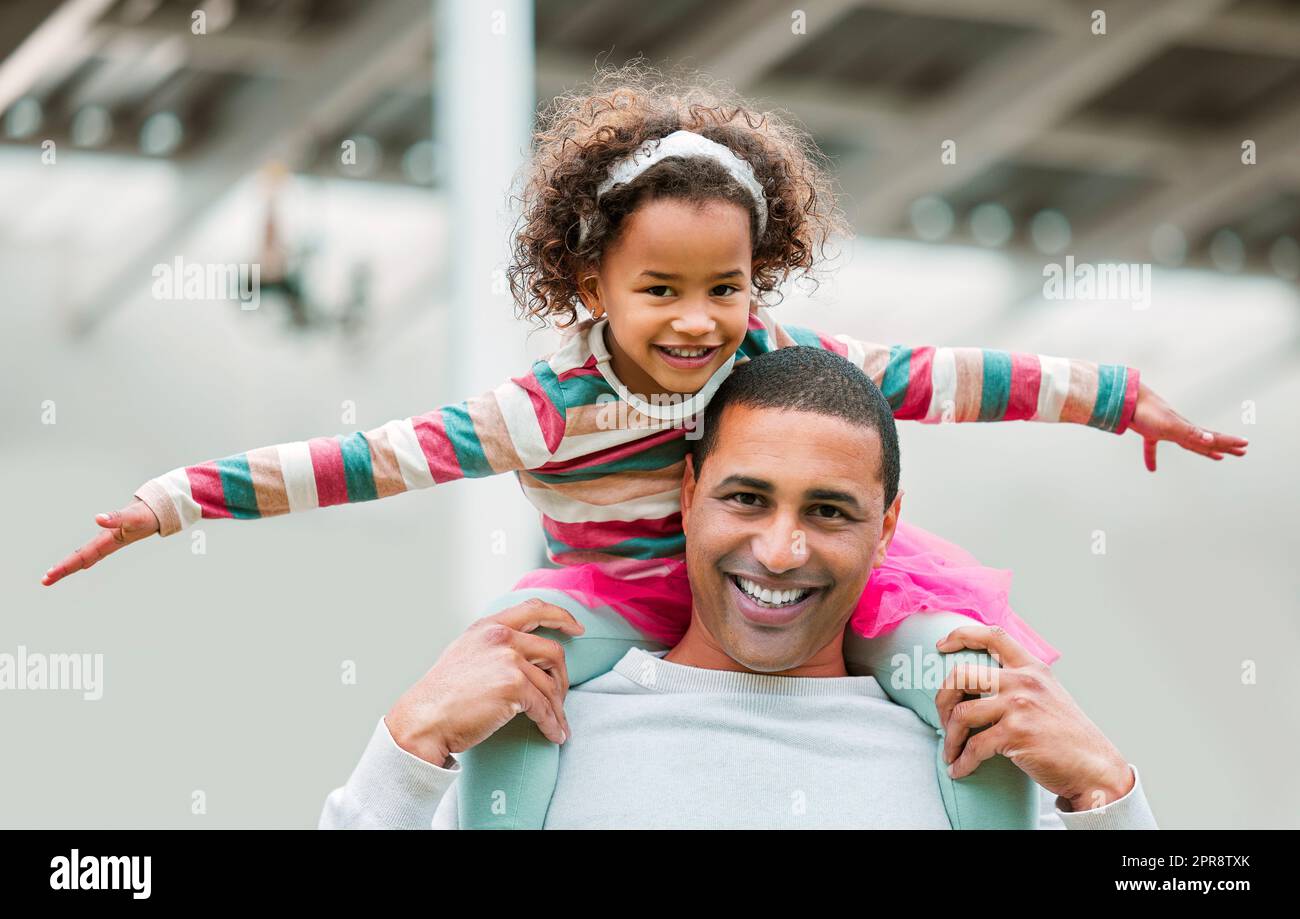 Man carrying a child hi-res stock photography and images - Alamy
