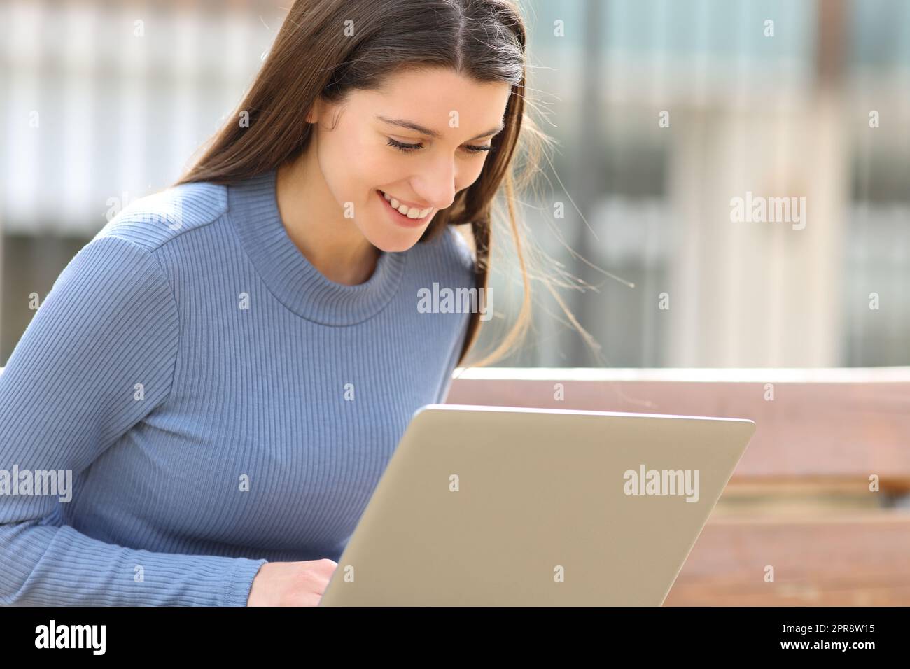 Student typing laptop teen hi-res stock photography and images - Alamy
