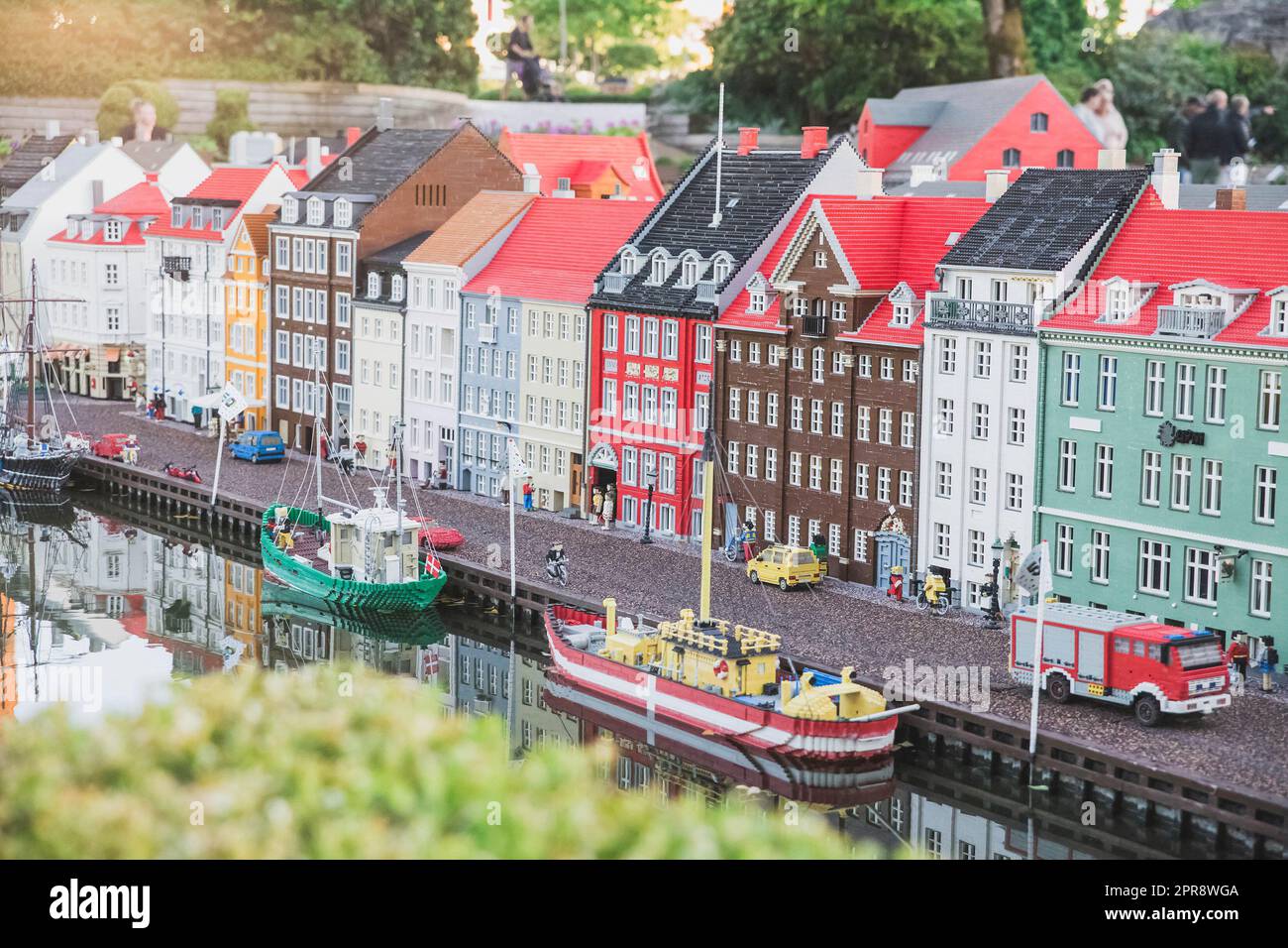 People walk in Legoland in a miniature city made of constructor Stock ...
