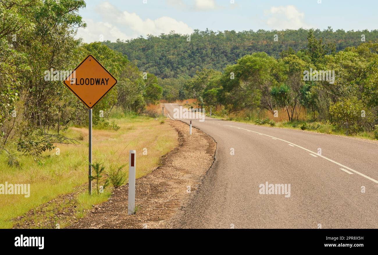 A rural road sign indicating a floodway zone Stock Photo - Alamy