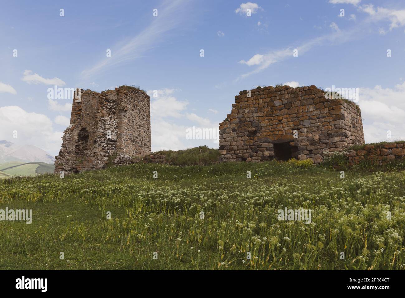 Akhalkalaki castle ruins of medieval towers on a hill above Akhalkalaki ...