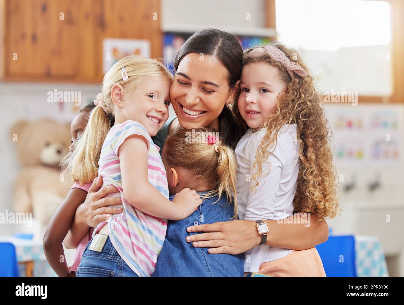 Happy diverse teacher and children hi-res stock photography and images ...