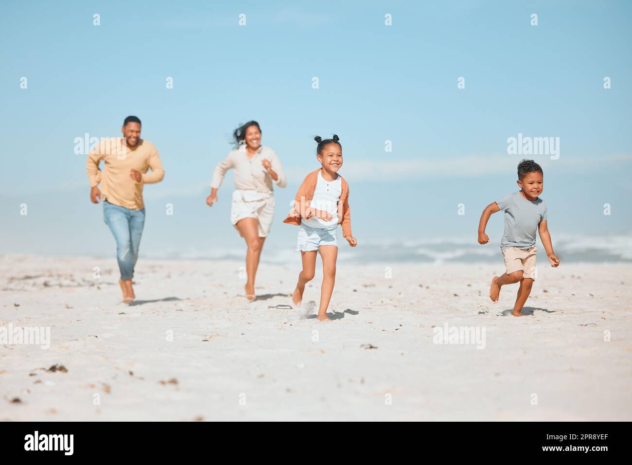 Family together active hi-res stock photography and images - Alamy