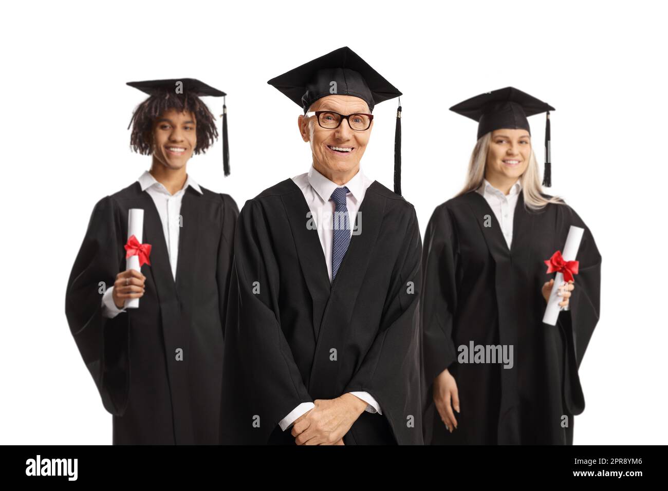 Senior professor and graduate students in gowns posing isolated on ...