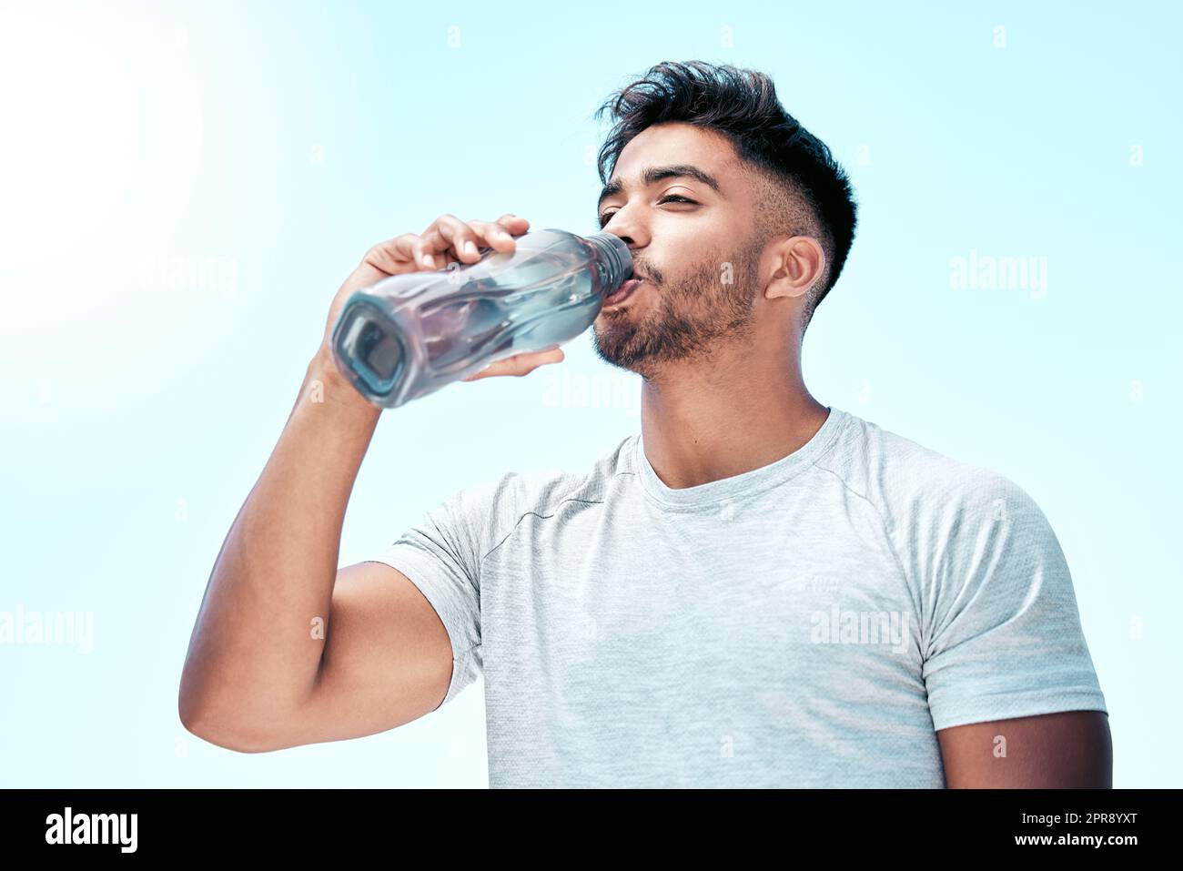 Man Bottled Water While Exercising