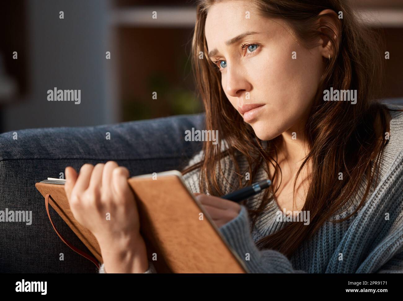 Person sad writing journal hi-res stock photography and images - Alamy