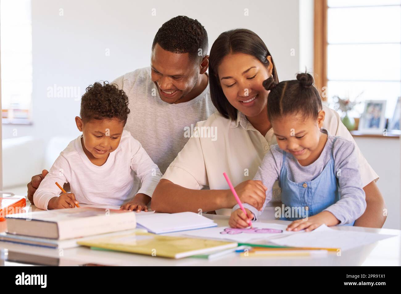 Kids studying with parents hi-res stock photography and images - Alamy