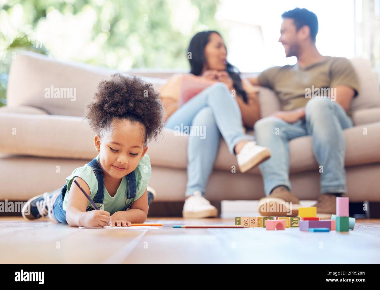 She loves to entertain herself. Full length shot of an adorable little ... She loves to entertain herself. Full length shot of an adorable little ...