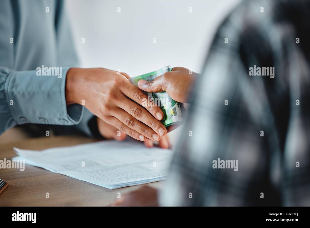 Business people exchanging documents hi-res stock photography and ...