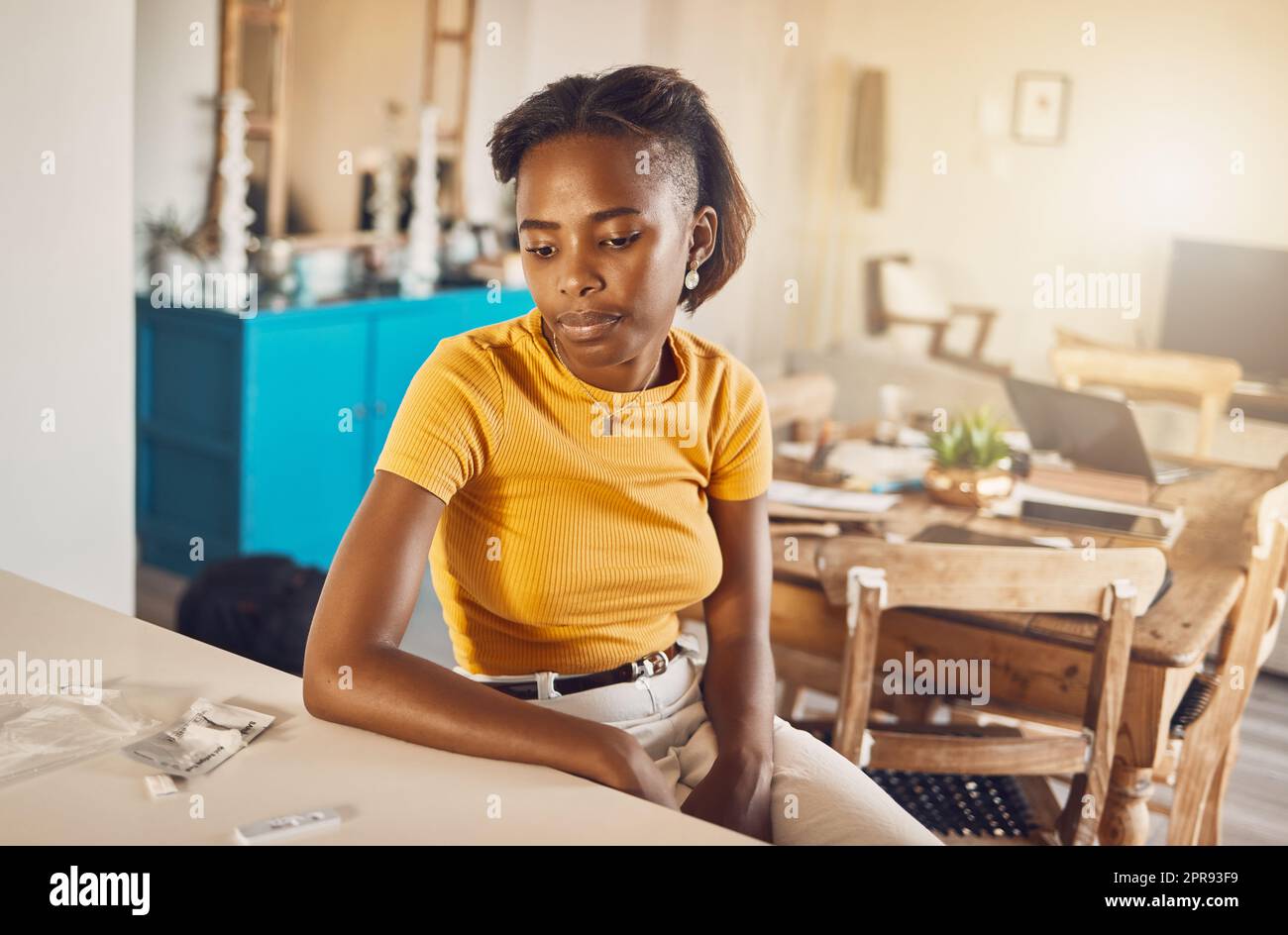 A woman test for covid waiting for the results from the kit at home ...