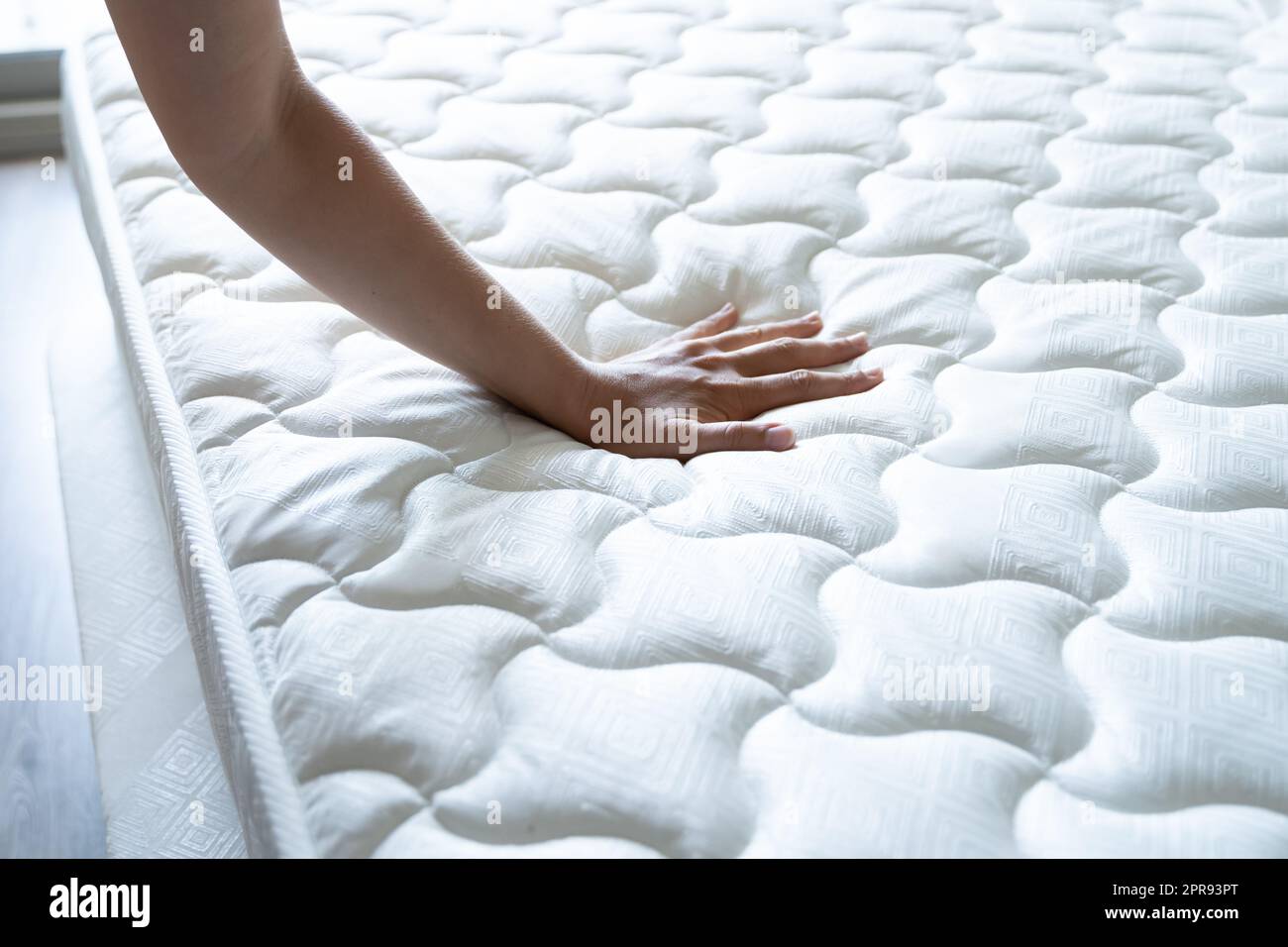 Hand Testing Orthopedic Memory Foam Core Stock Photo - Alamy