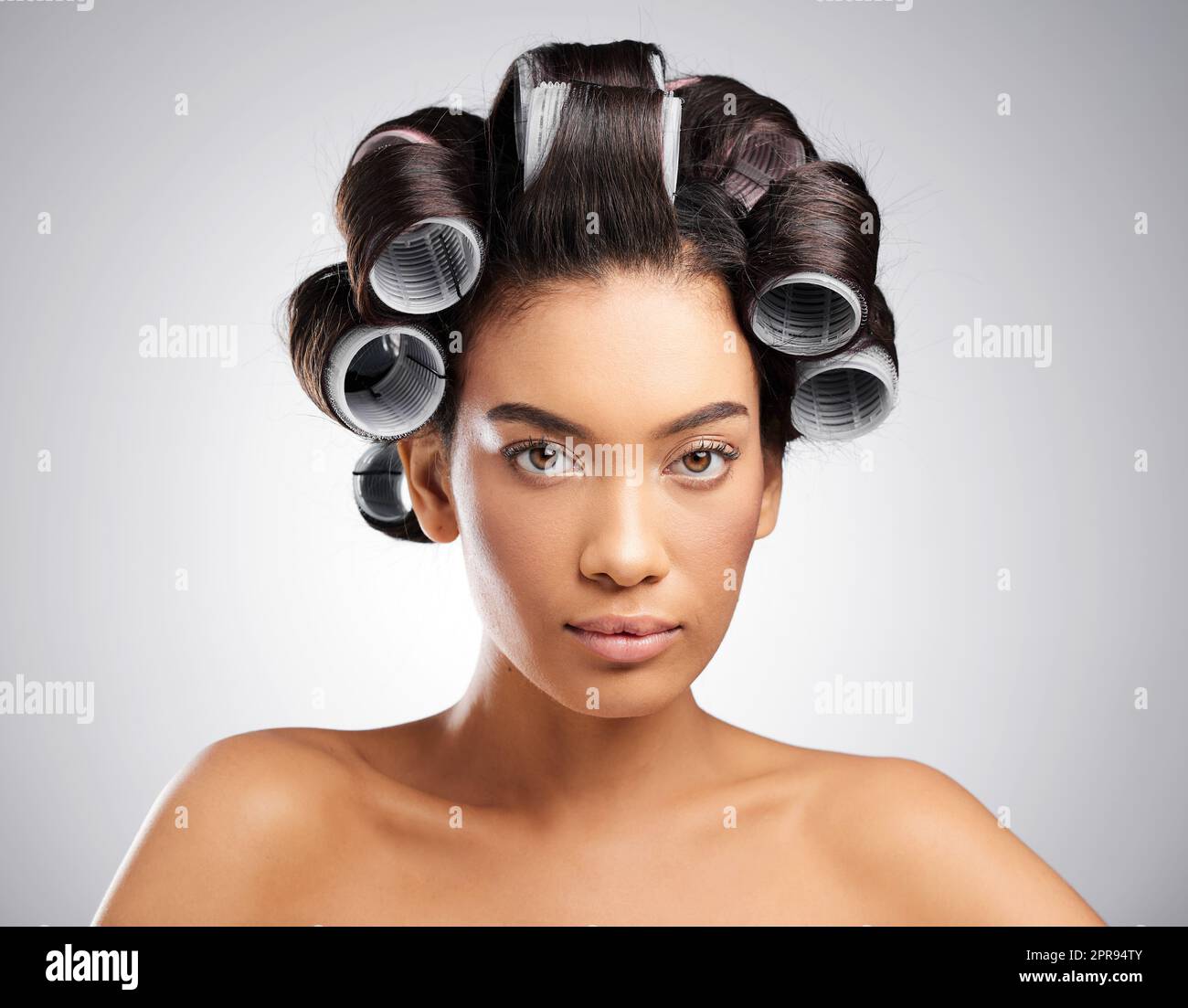 Woman in hair curlers hi-res stock photography and images - Alamy